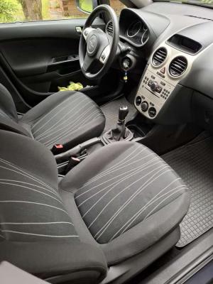 Opel Corsa 2007 in Siauliai, with an engine capacity of 1.25 L and mileage of 164 thousand km for 1400 €, photo 7 on AUTOMOTO.COM.LV