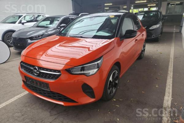 Orange Opel Corsa 2023 in Riga, with an engine capacity of 1.40 L and mileage of 61 thousand km for 16499 €, photo 1 on AUTOMOTO.COM.LV