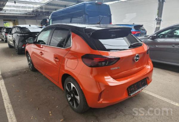 Orange Opel Corsa 2023 in Riga, with an engine capacity of 1.40 L and mileage of 61 thousand km for 16499 €, photo 4 on AUTOMOTO.COM.LV