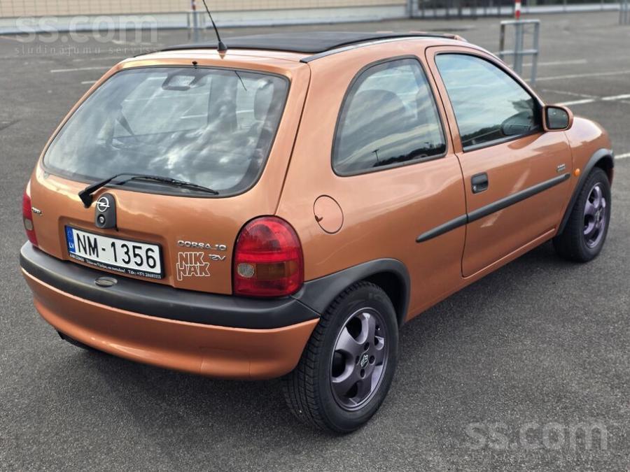 Oranžs Opel Corsa 2000 Rīga, ar dzinēja tilpumu 1.00 L un nobraukumu 189 tūkst. km par 1600 €, foto 4 vietnē AUTOMOTO.COM.LV