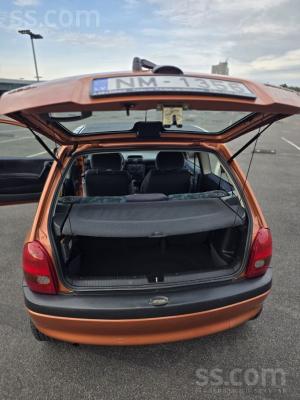 Oranžs Opel Corsa 2000 Rīga, ar dzinēja tilpumu 1.00 L un nobraukumu 189 tūkst. km par 1600 €, foto 9 vietnē AUTOMOTO.COM.LV