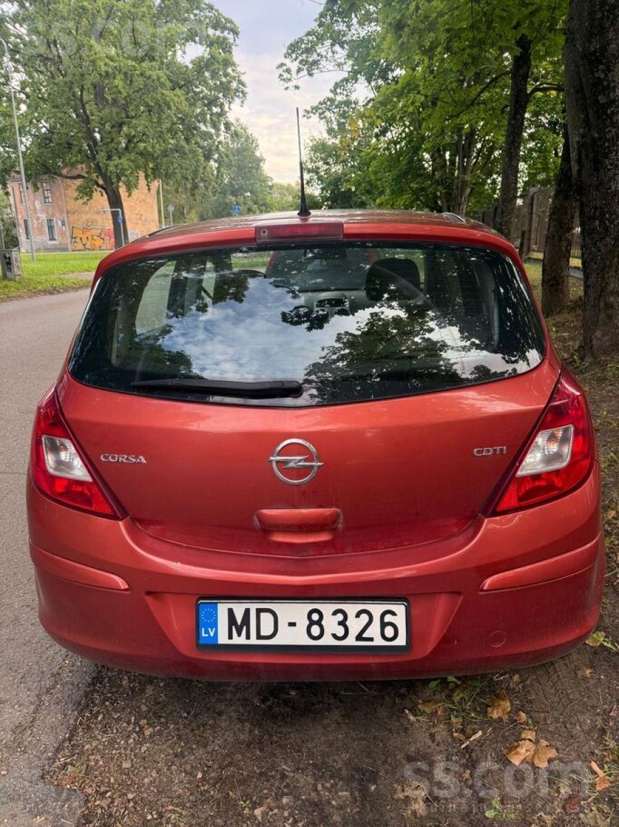 Oranžs Opel Corsa 2011 Rīga, ar dzinēja tilpumu 1.30 L un nobraukumu 184 tūkst. km par 2100 €, foto 6 vietnē AUTOMOTO.COM.LV