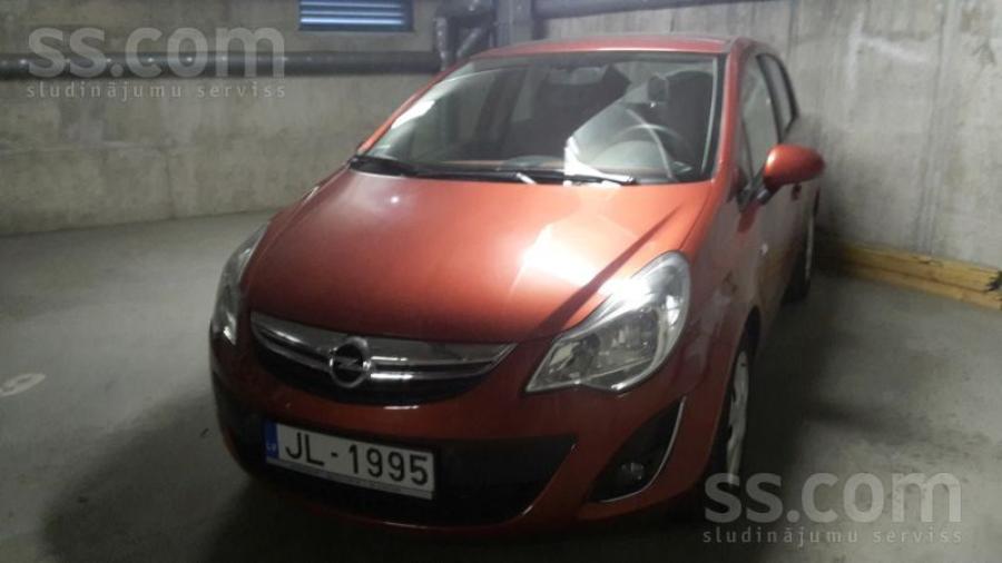 Orange Opel Corsa 2012 in Riga, with an engine capacity of 1.20 L and mileage of 79 thousand km for 3900 €, photo 1 on AUTOMOTO.COM.LV