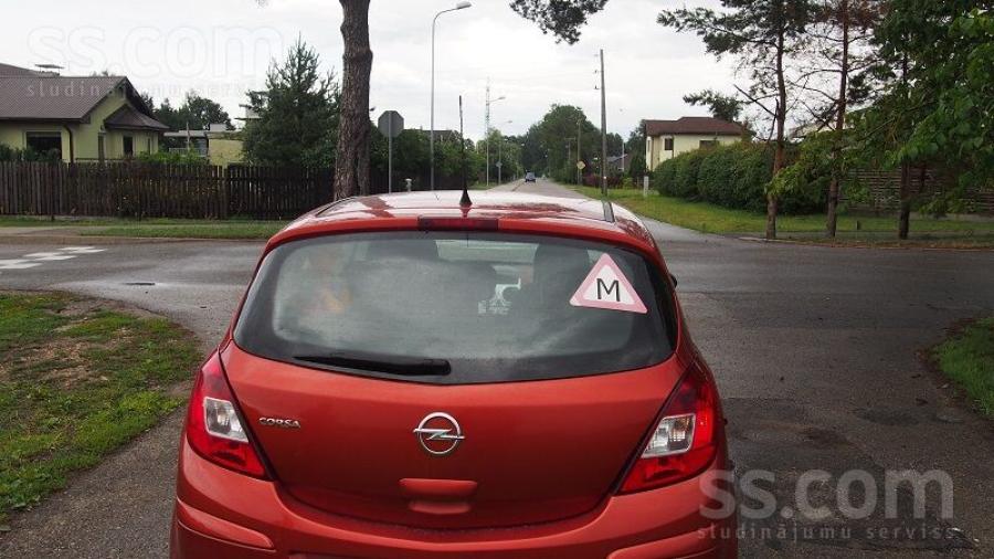 Orange Opel Corsa 2012 in Riga, with an engine capacity of 1.20 L and mileage of 79 thousand km for 3900 €, photo 5 on AUTOMOTO.COM.LV