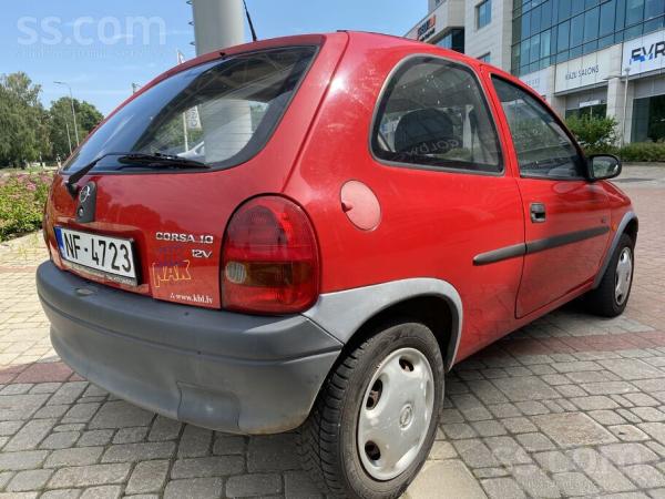 Sarkans Opel Corsa 1999 Rīga, ar dzinēja tilpumu 1.00 L un nobraukumu 0 tūkst. km par 800 €, foto 4 vietnē AUTOMOTO.COM.LV