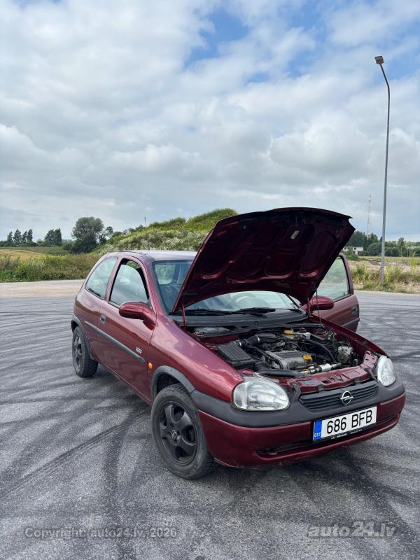 Sarkans Opel Corsa 2000 Tallina, ar dzinēja tilpumu 1.00 L un nobraukumu 130 tūkst. km par 1150 €, foto 4 vietnē AUTOMOTO.COM.LV