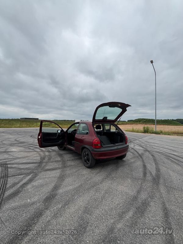 Sarkans Opel Corsa 2000 Tallina, ar dzinēja tilpumu 1.00 L un nobraukumu 130 tūkst. km par 1150 €, foto 5 vietnē AUTOMOTO.COM.LV