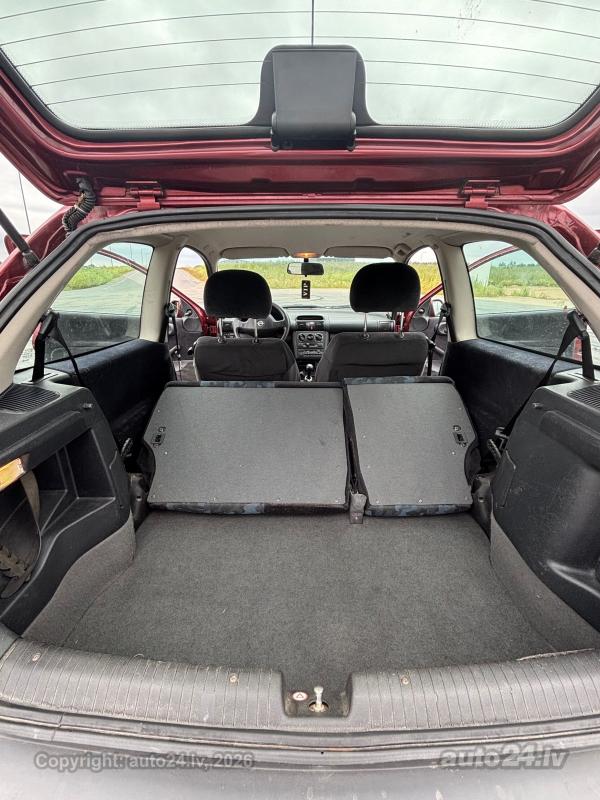 Sarkans Opel Corsa 2000 Tallina, ar dzinēja tilpumu 1.00 L un nobraukumu 130 tūkst. km par 1150 €, foto 6 vietnē AUTOMOTO.COM.LV