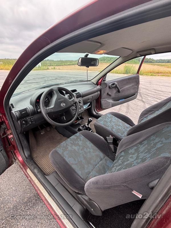 Sarkans Opel Corsa 2000 Tallina, ar dzinēja tilpumu 1.00 L un nobraukumu 130 tūkst. km par 1150 €, foto 7 vietnē AUTOMOTO.COM.LV