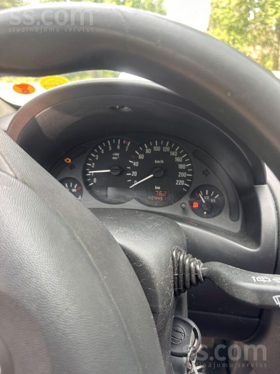 Sarkans Opel Corsa 2002 Rīga, ar dzinēja tilpumu 1.20 L un nobraukumu 204 tūkst. km par 600 €, foto 6 vietnē AUTOMOTO.COM.LV