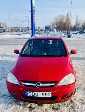 Red Opel Corsa 2005 in Klaipeda, with an engine capacity of 1.20 L and mileage of 169 thousand km for 990 €, photo  on AUTOMOTO.COM.LV