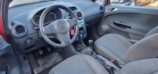 Red Opel Corsa 2007 in Valmiera, with an engine capacity of 1.20 L and mileage of 285 thousand km for 1650 €, photo 8 on AUTOMOTO.COM.LV