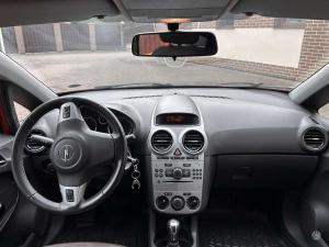 Red Opel Corsa 2008 in Silute, with an engine capacity of 1.36 L and mileage of 162 thousand km for 3100 €, photo 14 on AUTOMOTO.COM.LV
