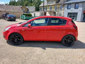 Sarkans Opel Corsa 2009 Kelmė, ar dzinēja tilpumu 1.36 L un nobraukumu 160 tūkst. km par 2750 €, foto 5 vietnē AUTOMOTO.COM.LV
