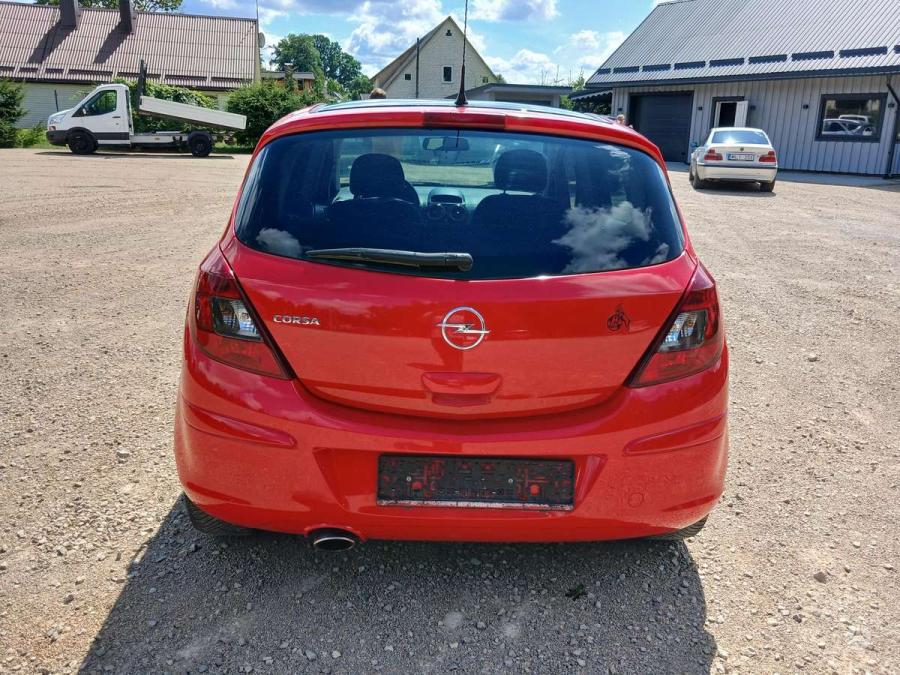 Sarkans Opel Corsa 2009 Kelmė, ar dzinēja tilpumu 1.36 L un nobraukumu 160 tūkst. km par 2750 €, foto 7 vietnē AUTOMOTO.COM.LV