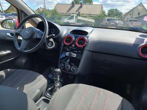 Sarkans Opel Corsa 2009 Kelmė, ar dzinēja tilpumu 1.36 L un nobraukumu 160 tūkst. km par 2750 €, foto 12 vietnē AUTOMOTO.COM.LV