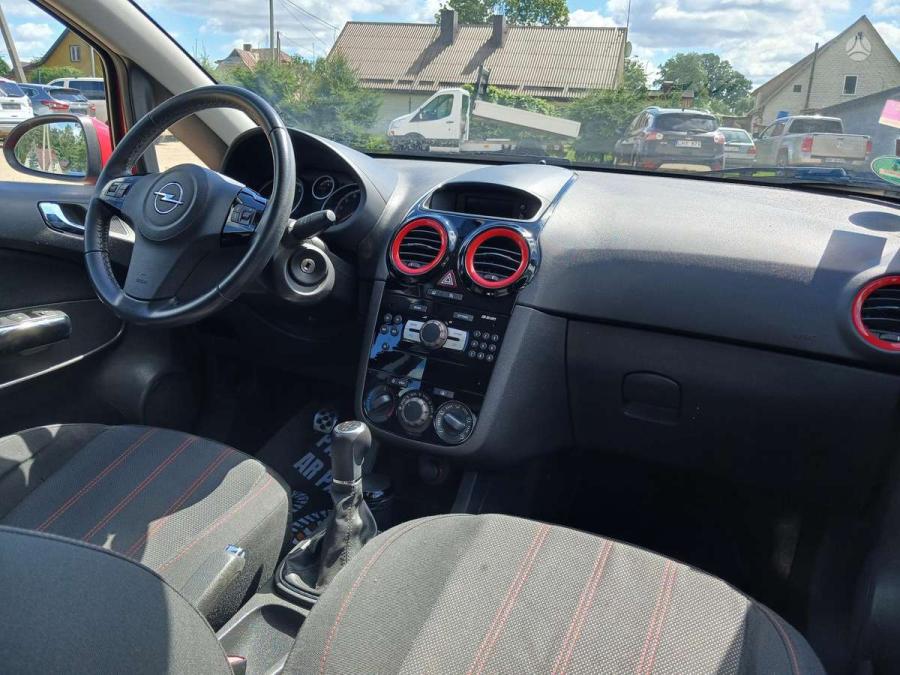 Sarkans Opel Corsa 2009 Kelmė, ar dzinēja tilpumu 1.36 L un nobraukumu 160 tūkst. km par 2750 €, foto 12 vietnē AUTOMOTO.COM.LV