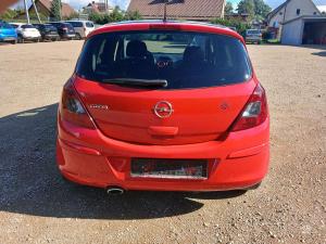 Sarkans Opel Corsa 2009 Kelmė, ar dzinēja tilpumu 1.39 L un nobraukumu 160 tūkst. km par 2600 €, foto 7 vietnē AUTOMOTO.COM.LV