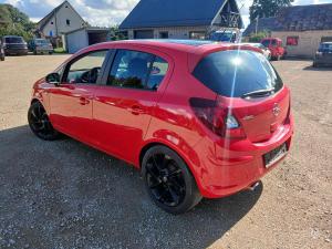 Sarkans Opel Corsa 2009 Kelmė, ar dzinēja tilpumu 1.39 L un nobraukumu 160 tūkst. km par 2600 €, foto 8 vietnē AUTOMOTO.COM.LV