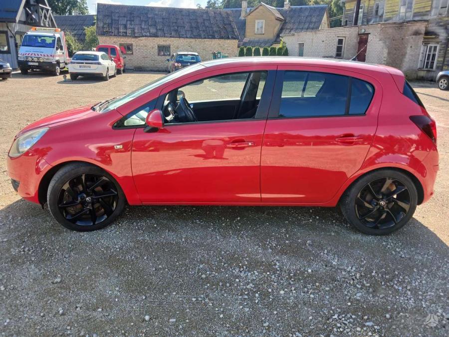 Sarkans Opel Corsa 2009 Kelmė, ar dzinēja tilpumu 1.39 L un nobraukumu 160 tūkst. km par 2600 €, foto 9 vietnē AUTOMOTO.COM.LV