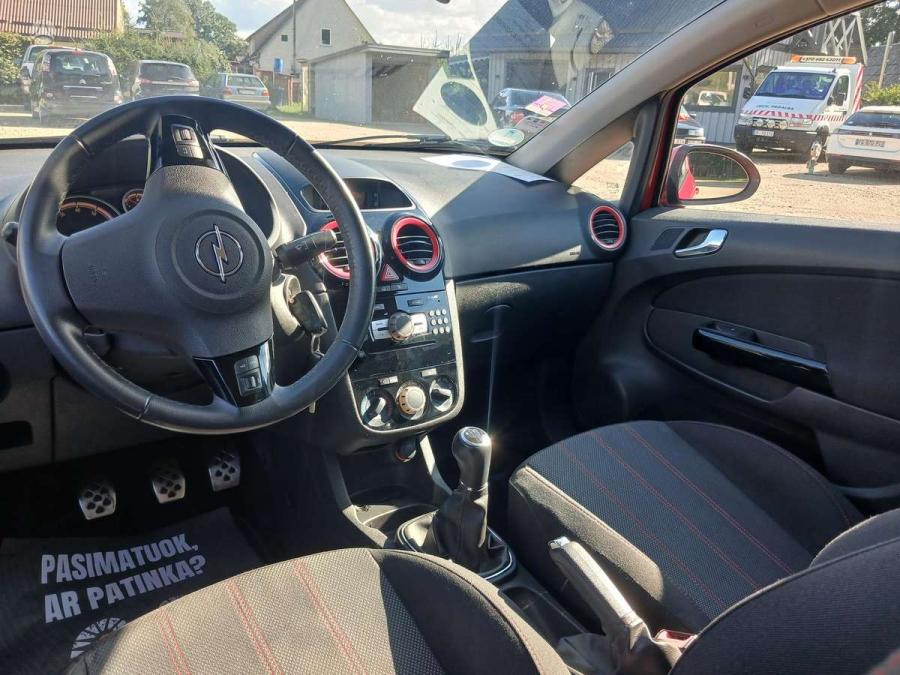 Sarkans Opel Corsa 2009 Kelmė, ar dzinēja tilpumu 1.39 L un nobraukumu 160 tūkst. km par 2600 €, foto 11 vietnē AUTOMOTO.COM.LV