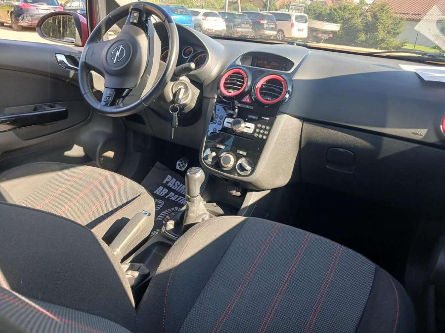 Sarkans Opel Corsa 2009 Kelmė, ar dzinēja tilpumu 1.39 L un nobraukumu 160 tūkst. km par 2600 €, foto 13 vietnē AUTOMOTO.COM.LV