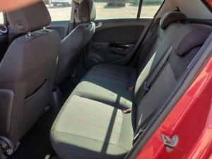 Sarkans Opel Corsa 2009 Kelmė, ar dzinēja tilpumu 1.39 L un nobraukumu 160 tūkst. km par 2600 €, foto 15 vietnē AUTOMOTO.COM.LV