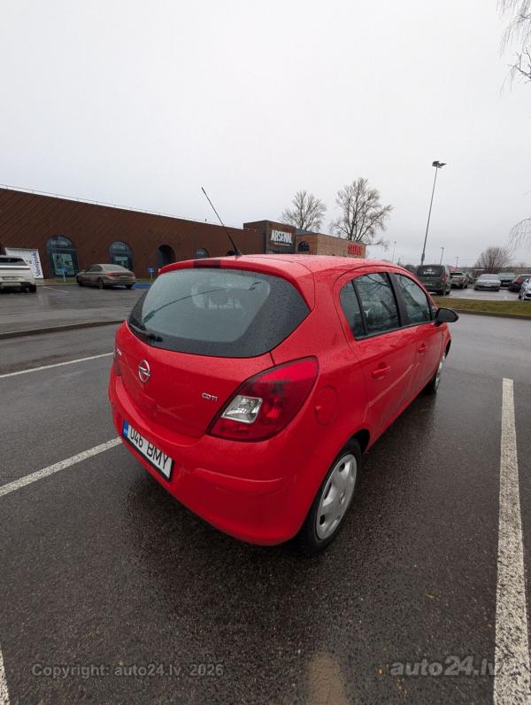 Sarkans Opel Corsa 2011 Tallina, ar dzinēja tilpumu 1.20 L un nobraukumu 254 tūkst. km par 2250 €, foto 3 vietnē AUTOMOTO.COM.LV