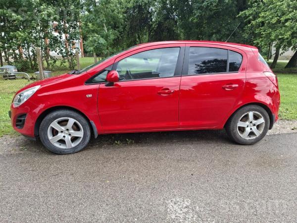 Red Opel Corsa 2011 in Liepaja, with an engine capacity of 1.30 L and mileage of 301 thousand km for 2100 €, photo 2 on AUTOMOTO.COM.LV