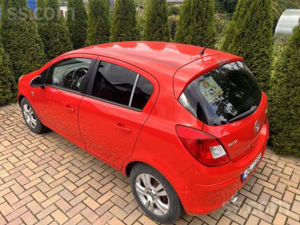Красный Опель Корса 2011 в Рига, объемом двигателя 1.20 л и пробегом 165 тыс. км за 3000 €, фото 3 на AUTOMOTO.COM.LV