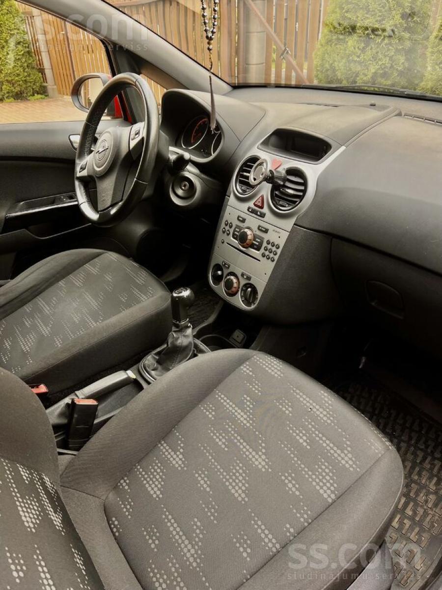 Red Opel Corsa 2011 in Riga, with an engine capacity of 1.20 L and mileage of 165 thousand km for 3000 €, photo 9 on AUTOMOTO.COM.LV