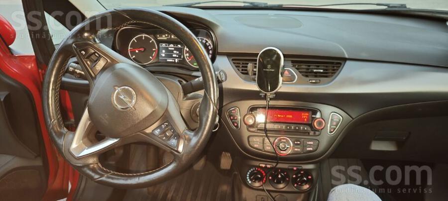 Red Opel Corsa 2015 in Riga, with an engine capacity of 1.60 L and mileage of 313 thousand km for 2980 €, photo 6 on AUTOMOTO.COM.LV