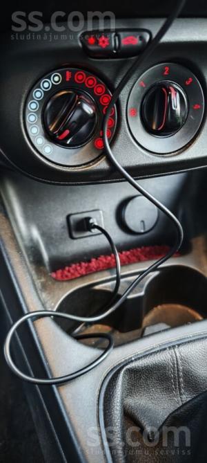 Red Opel Corsa 2015 in Riga, with an engine capacity of 1.60 L and mileage of 313 thousand km for 2980 €, photo 8 on AUTOMOTO.COM.LV