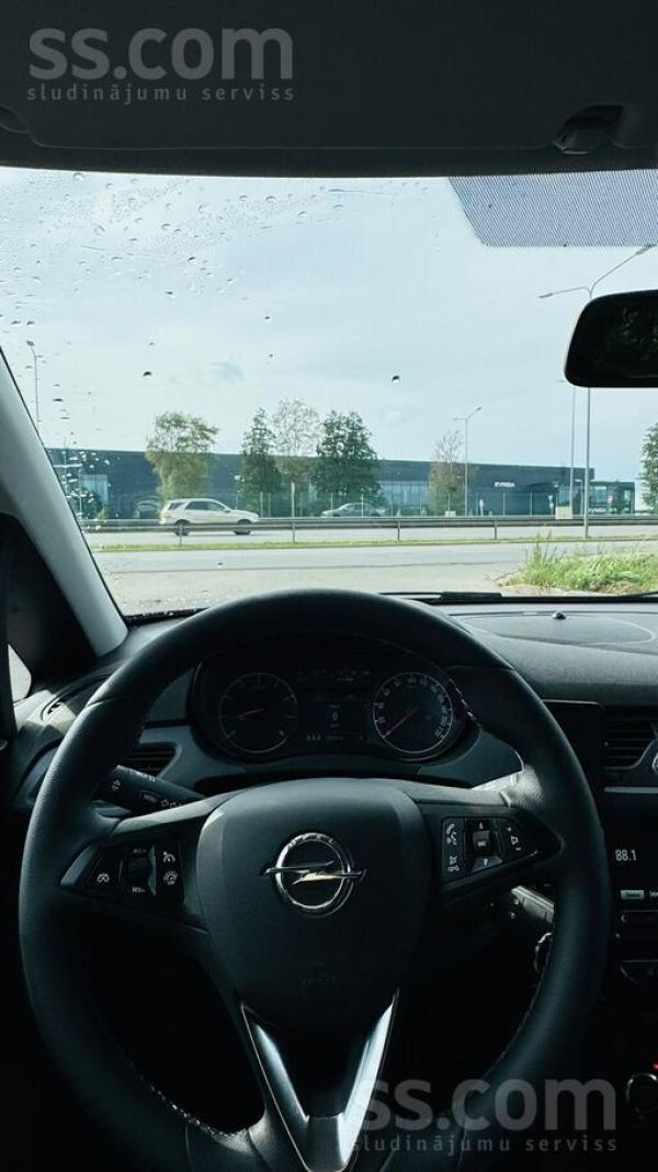 Red Opel Corsa 2016 in Riga, with an engine capacity of 1.40 L and mileage of 189 thousand km for 6550 €, photo 3 on AUTOMOTO.COM.LV