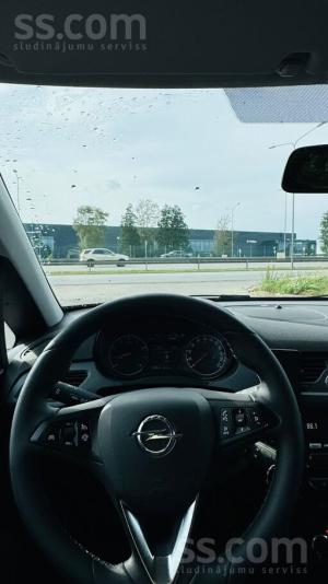 Red Opel Corsa 2016 in Riga, with an engine capacity of 1.40 L and mileage of 189 thousand km for 6550 €, photo 3 on AUTOMOTO.COM.LV