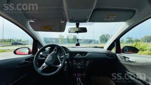 Red Opel Corsa 2016 in Riga, with an engine capacity of 1.40 L and mileage of 189 thousand km for 6550 €, photo 5 on AUTOMOTO.COM.LV