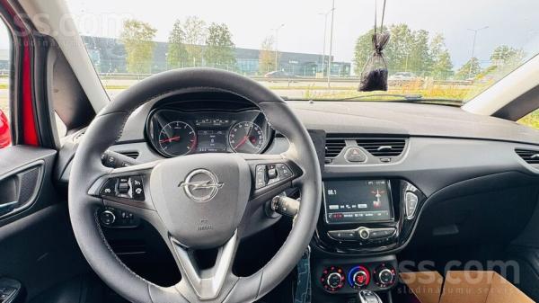 Red Opel Corsa 2016 in Riga, with an engine capacity of 1.40 L and mileage of 189 thousand km for 6550 €, photo 8 on AUTOMOTO.COM.LV