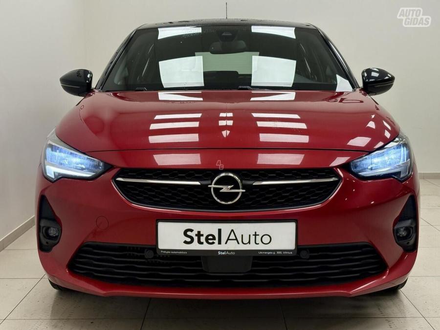 Red Opel Corsa 2021 in Vilnius, with an engine capacity of 1.20 L and mileage of 66 thousand km for 12500 €, photo 3 on AUTOMOTO.COM.LV