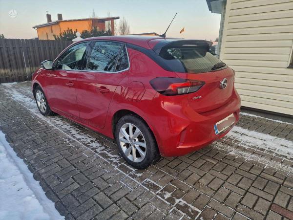 Red Opel Corsa 2021 in Marijampole, with an engine capacity of 1.20 L and mileage of 66 thousand km for 9500 €, photo 4 on AUTOMOTO.COM.LV