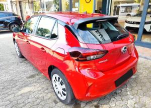 Red Opel Corsa 2021 in Riga, with an engine capacity of 1.40 L and mileage of 39 thousand km for 15300 €, photo 5 on AUTOMOTO.COM.LV
