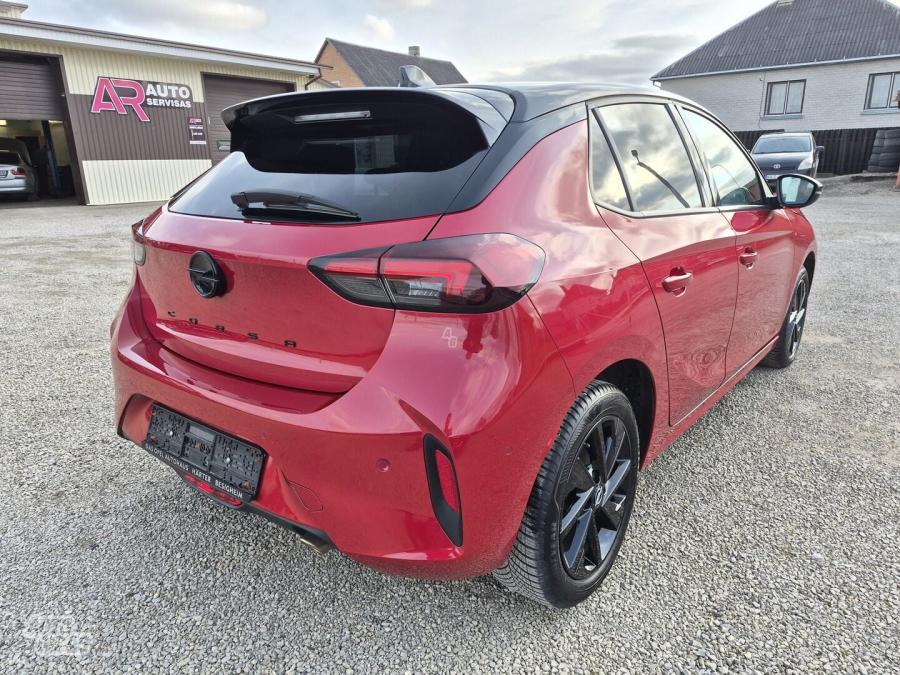 Red Opel Corsa 2023 in Vilnius, with an engine capacity of 1.20 L and mileage of 13 thousand km for 14400 €, photo 4 on AUTOMOTO.COM.LV