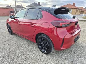 Red Opel Corsa 2023 in Vilnius, with an engine capacity of 1.20 L and mileage of 13 thousand km for 14400 €, photo 5 on AUTOMOTO.COM.LV