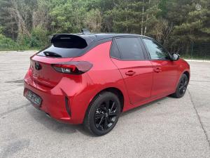 Red Opel Corsa 2023 in Kursenai, with an engine capacity of 1.20 L and mileage of 14 thousand km for 13799 €, photo 4 on AUTOMOTO.COM.LV