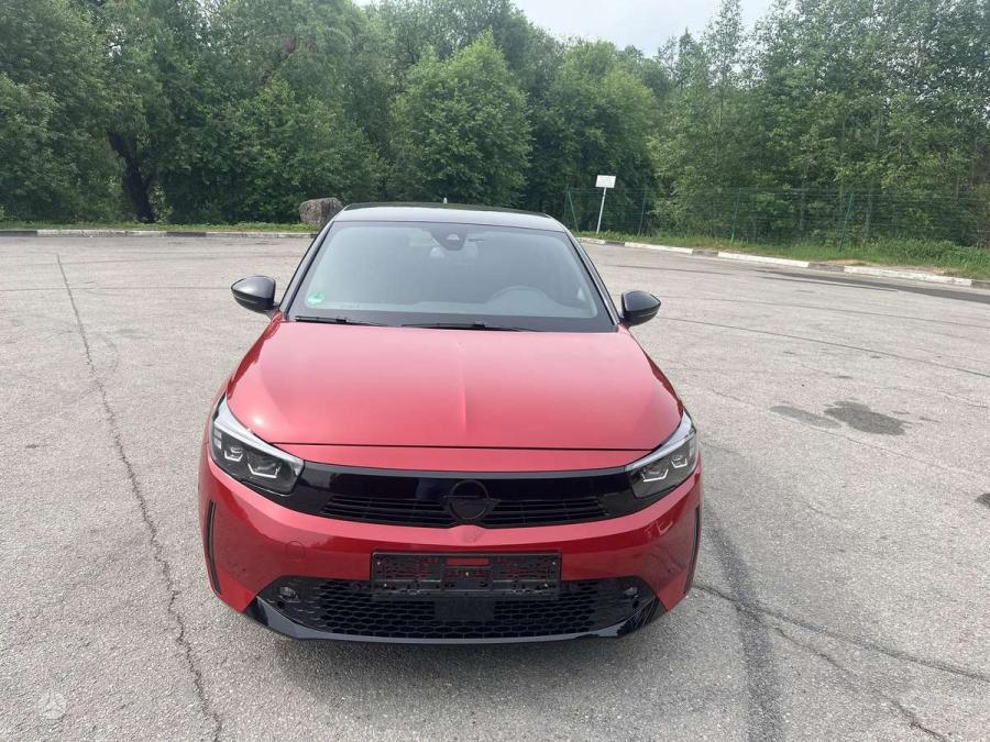 Red Opel Corsa 2023 in Kursenai, with an engine capacity of 1.20 L and mileage of 14 thousand km for 13799 €, photo 6 on AUTOMOTO.COM.LV