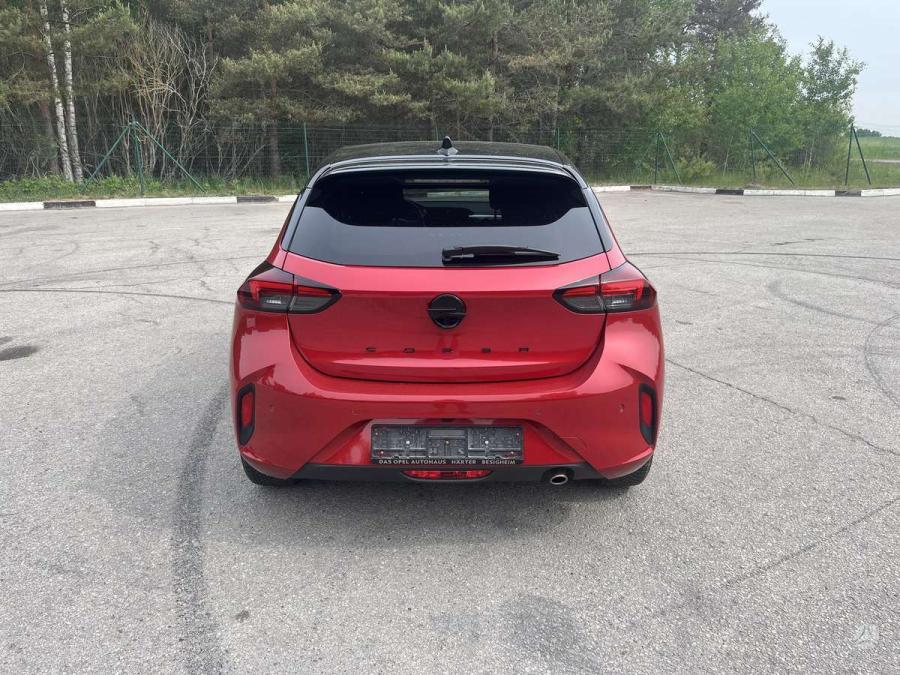 Red Opel Corsa 2023 in Kursenai, with an engine capacity of 1.20 L and mileage of 14 thousand km for 13799 €, photo 7 on AUTOMOTO.COM.LV