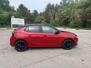 Red Opel Corsa 2023 in Kursenai, with an engine capacity of 1.20 L and mileage of 14 thousand km for 13799 €, photo 8 on AUTOMOTO.COM.LV