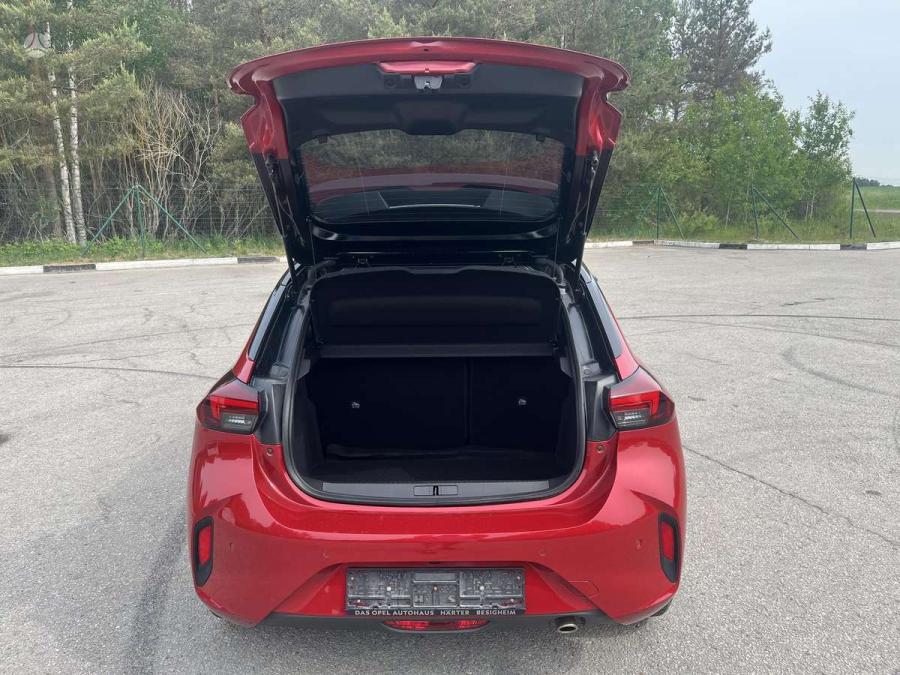 Red Opel Corsa 2023 in Kursenai, with an engine capacity of 1.20 L and mileage of 14 thousand km for 13799 €, photo 11 on AUTOMOTO.COM.LV