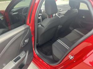 Red Opel Corsa 2023 in Kursenai, with an engine capacity of 1.20 L and mileage of 14 thousand km for 13799 €, photo 18 on AUTOMOTO.COM.LV