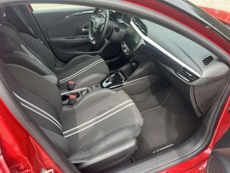 Red Opel Corsa 2023 in Kursenai, with an engine capacity of 1.20 L and mileage of 14 thousand km for 13799 €, photo 19 on AUTOMOTO.COM.LV