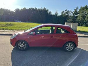 Red Opel Corsa 2008 in Vilnius, with an engine capacity of 1.00 L and mileage of 172 thousand km for 950 €, photo 10 on AUTOMOTO.COM.LV